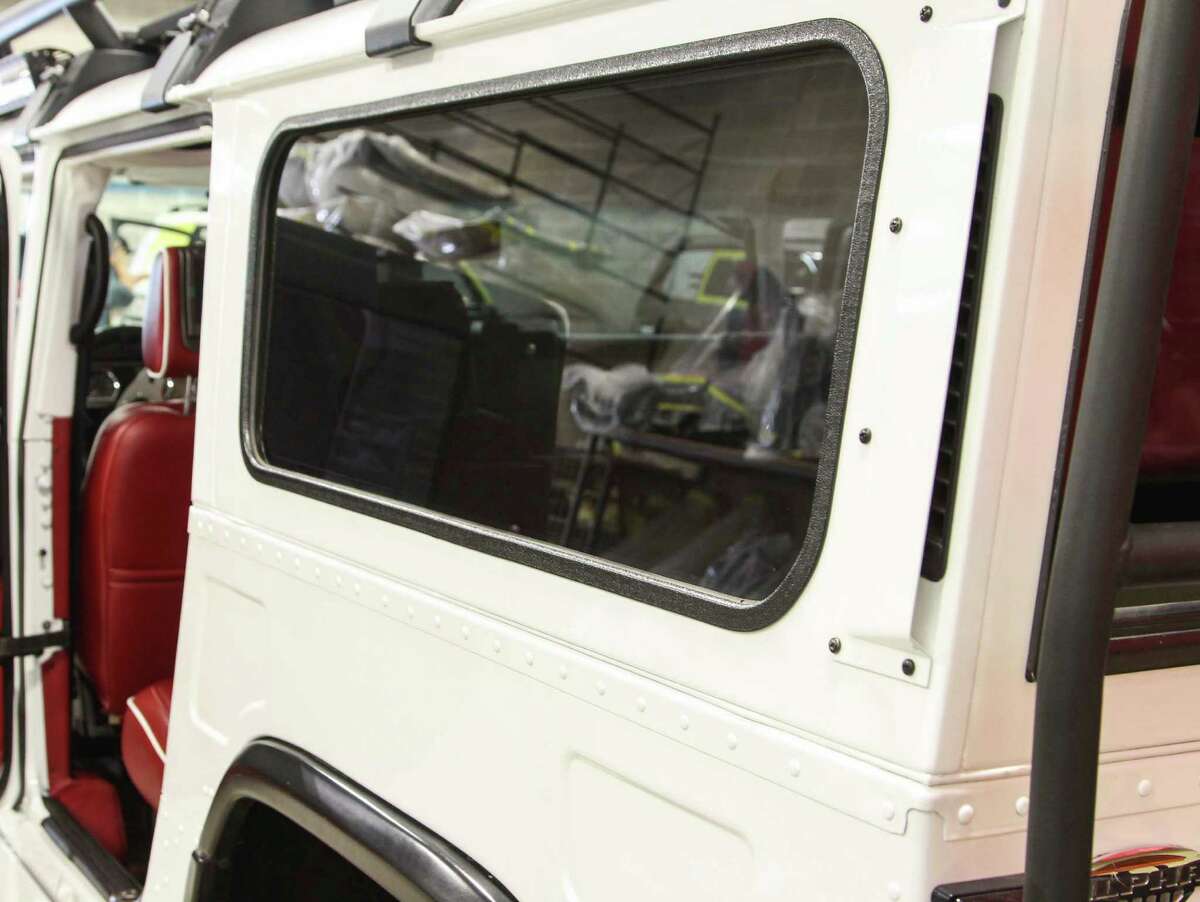 This decked out armored Hummer has shocking door handles, satellite TV ...