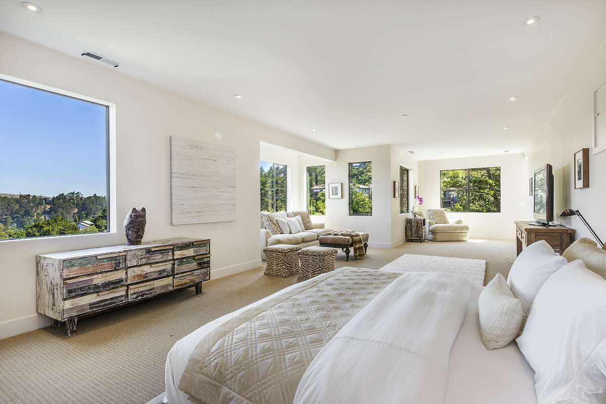 New patios, interior color scheme define Oakland view home