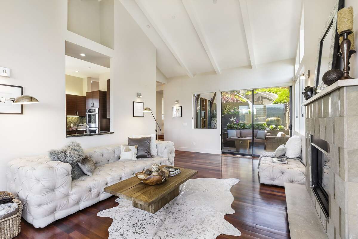 New patios, interior color scheme define Oakland view home