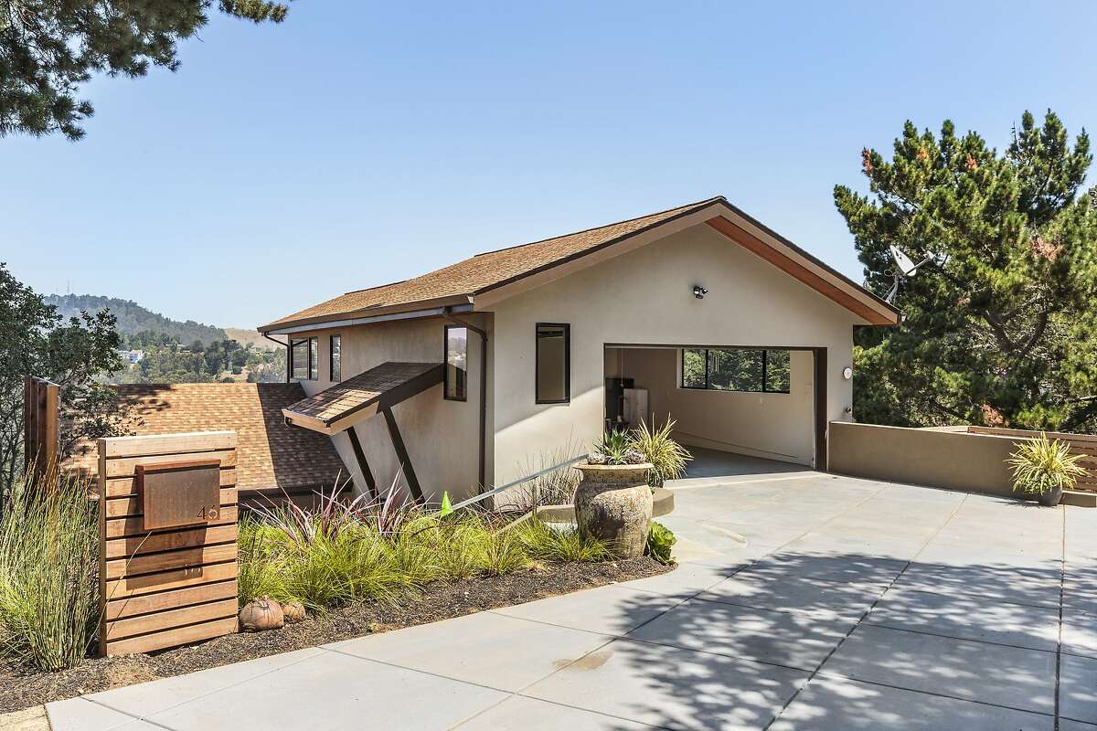 New patios, interior color scheme define Oakland view home