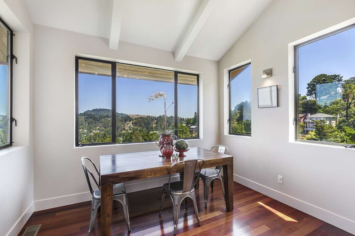 New patios, interior color scheme define Oakland view home