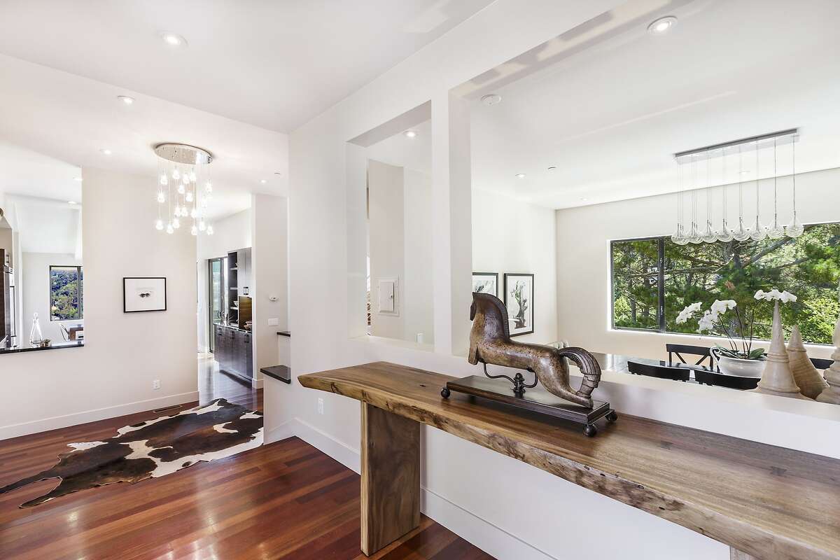 New patios, interior color scheme define Oakland view home