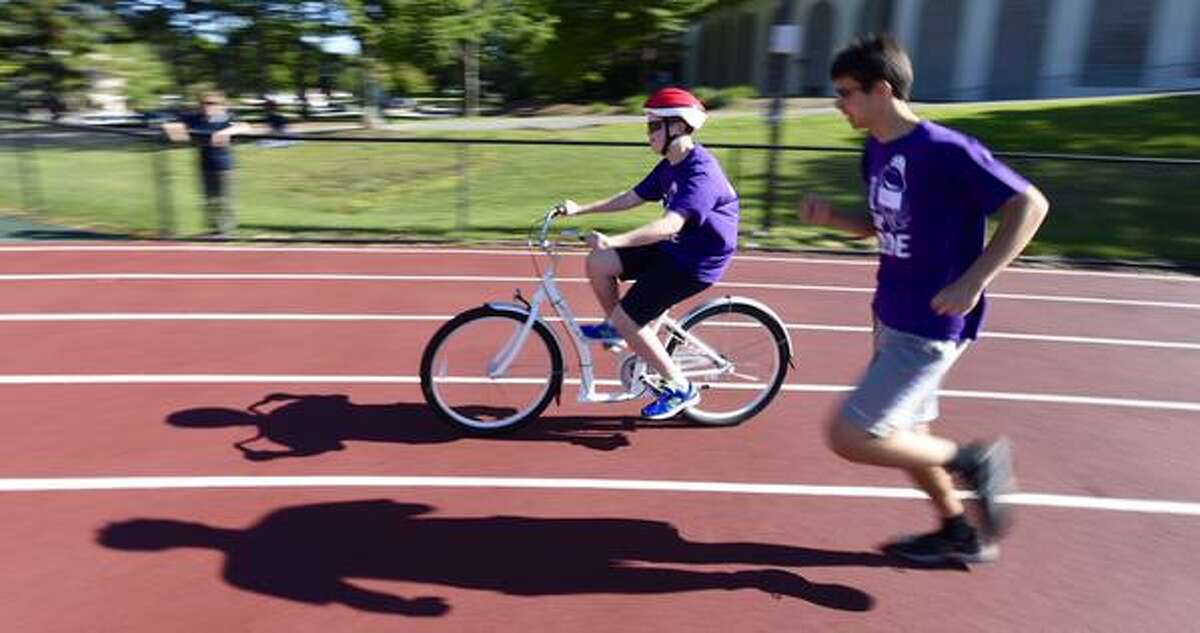 Disabled children learn to ride 2-wheel bikes at Union