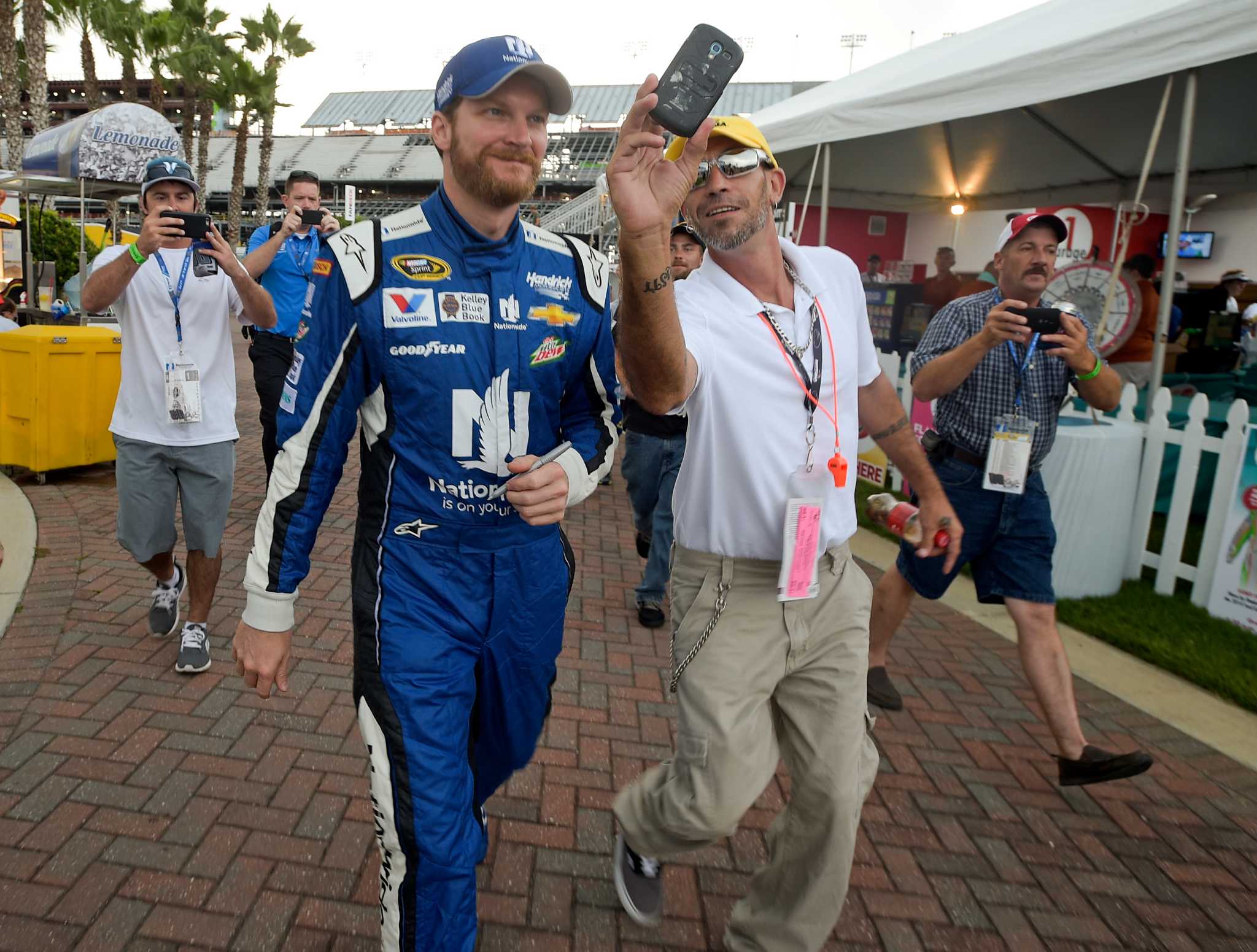 Dale Jr. wins pole as rain washes out qualifying