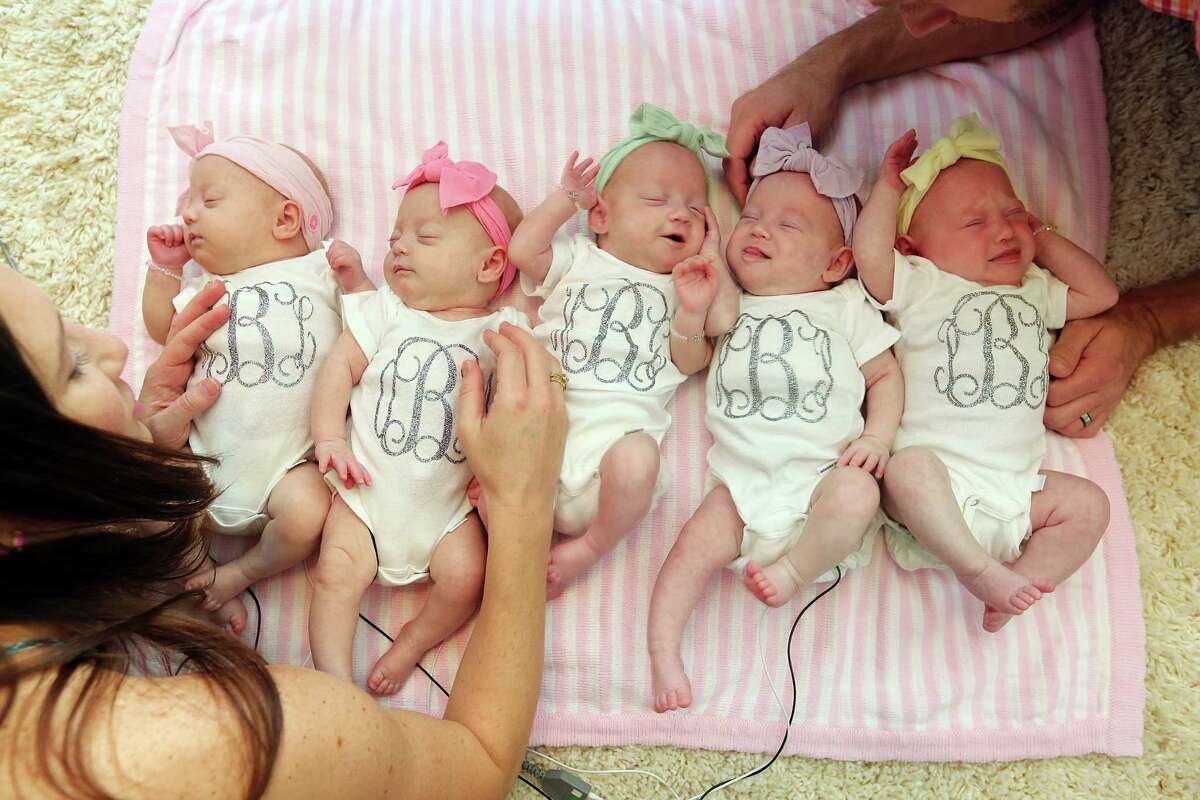 Last of all-girl quintuplets joins parents, sisters at home