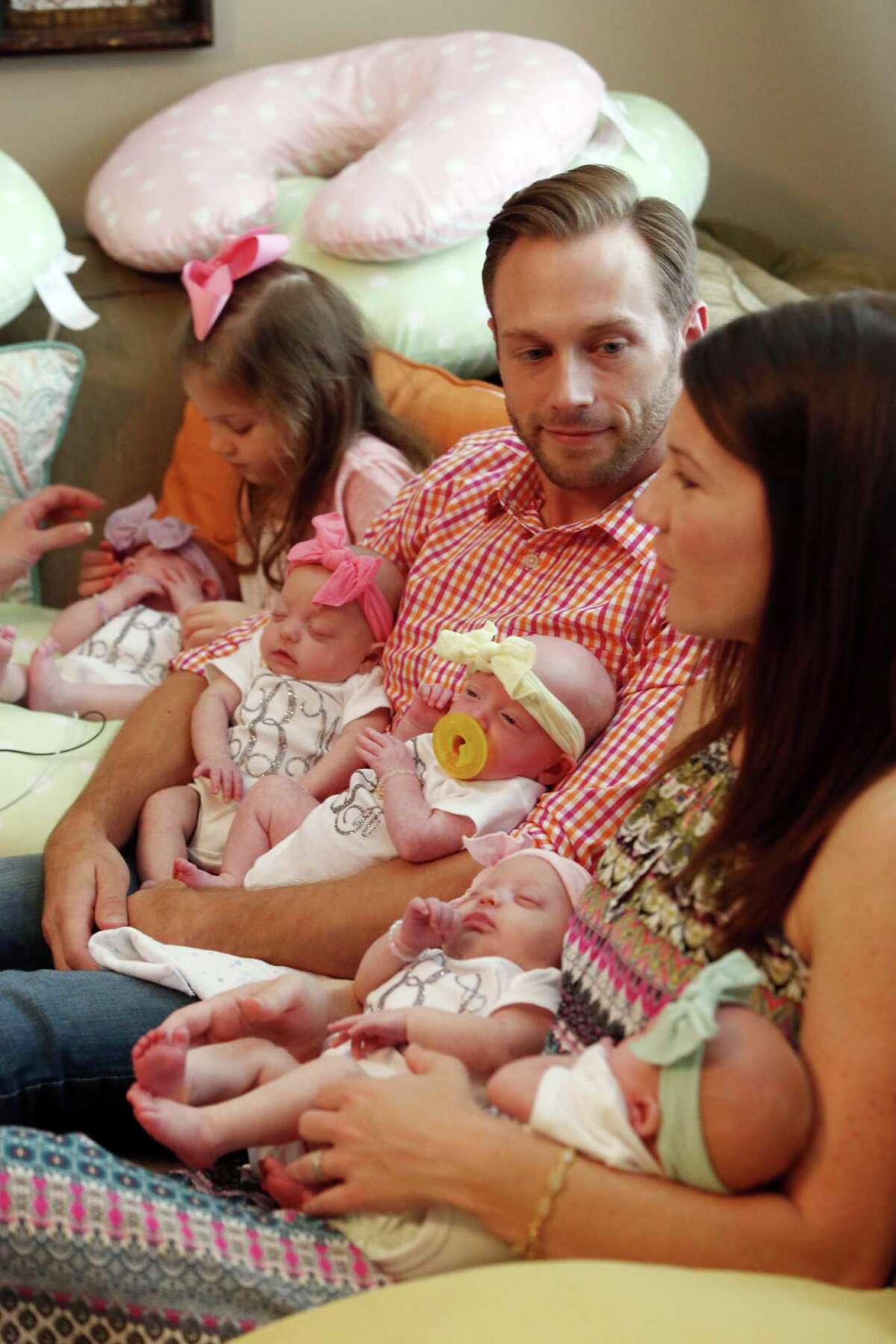 Last of all-girl quintuplets joins parents, sisters at home
