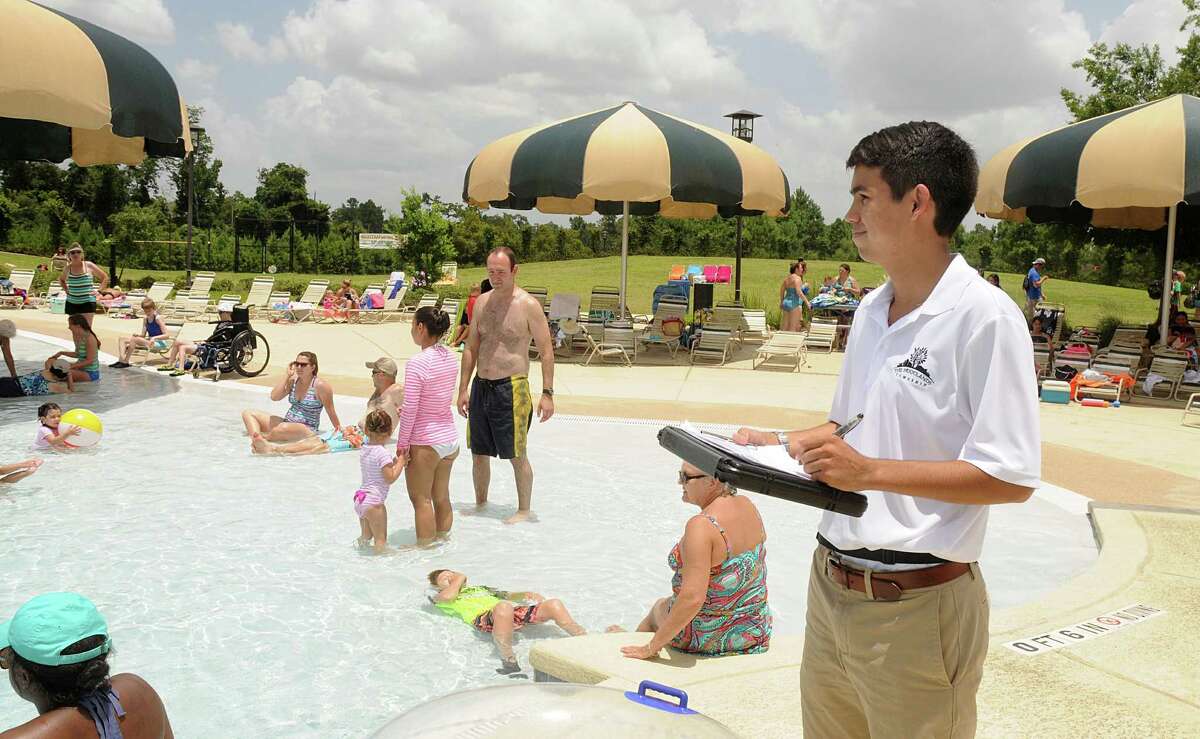 Symbols of summer, lifeguards help keep Woodlands pools safe
