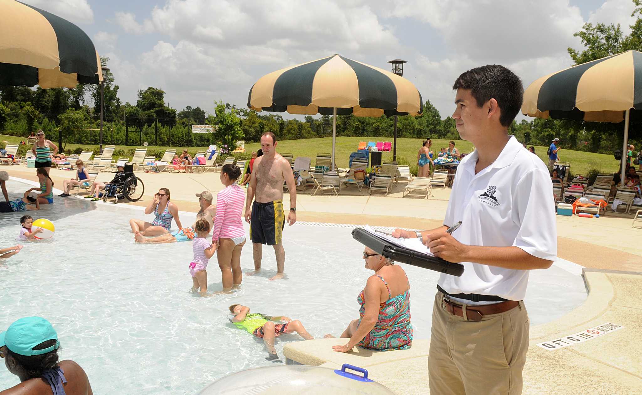 Symbols of summer, lifeguards help keep Woodlands pools safe