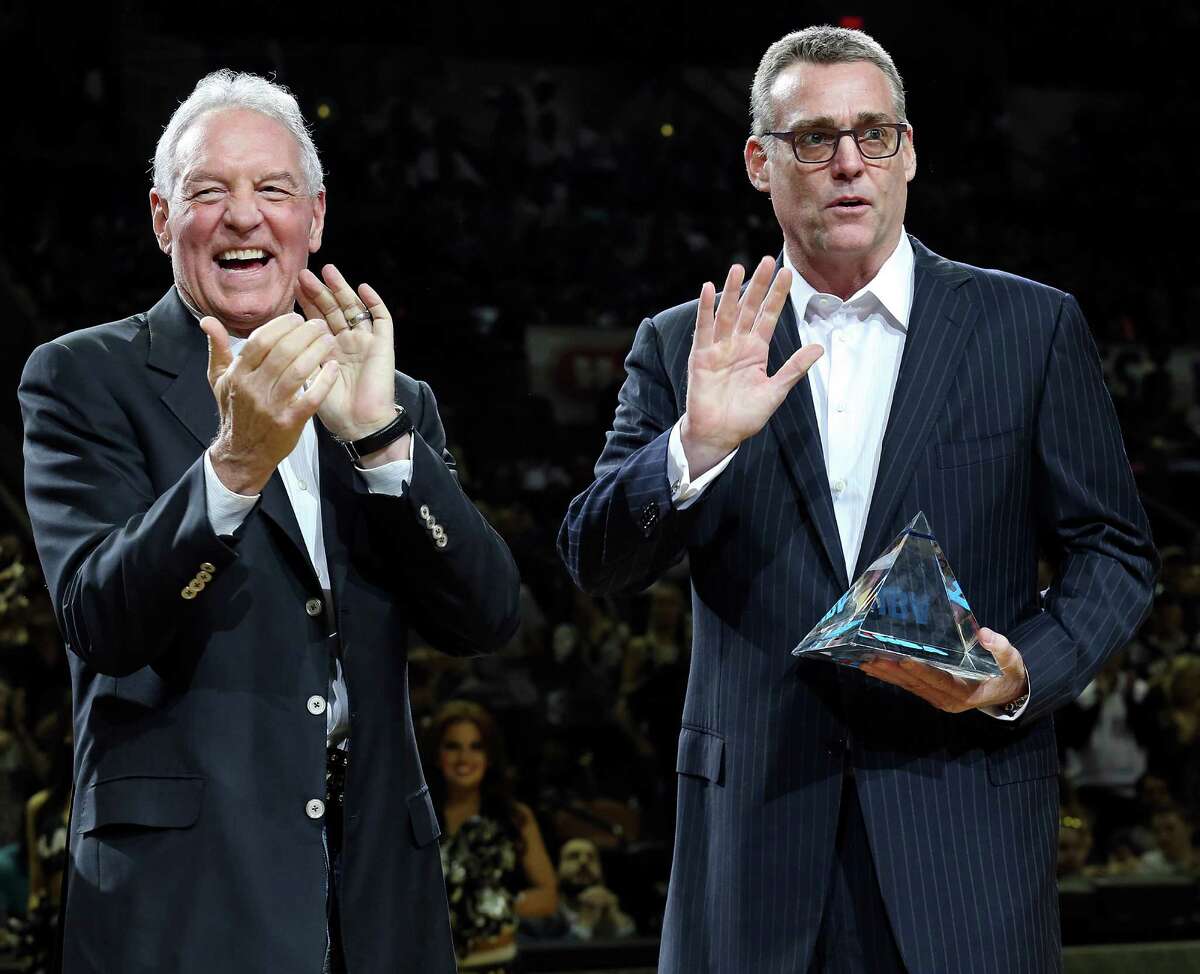 Spurs’ Buford off to the side, always looking ahead