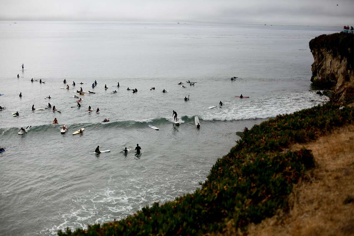 Surfers conquer Pacifica waves on International Surfing Day