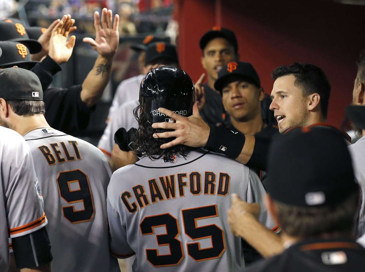 Brandon Crawford reenacts famous Candlestick Park photo in new ad