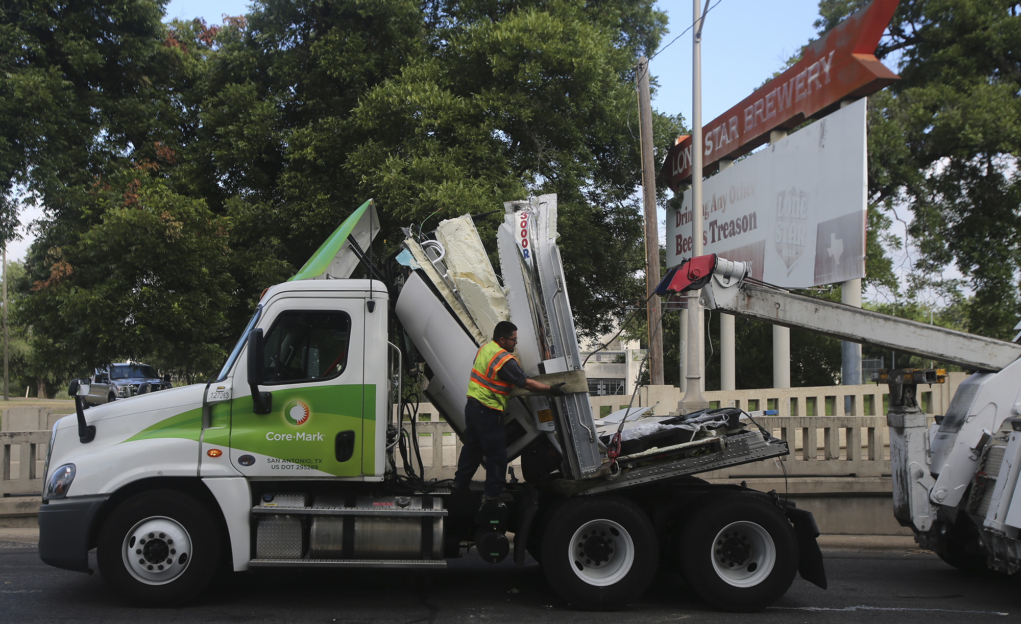 18 Wheeler Crashes Into South Side Bridge Spills Milk Food Over Road