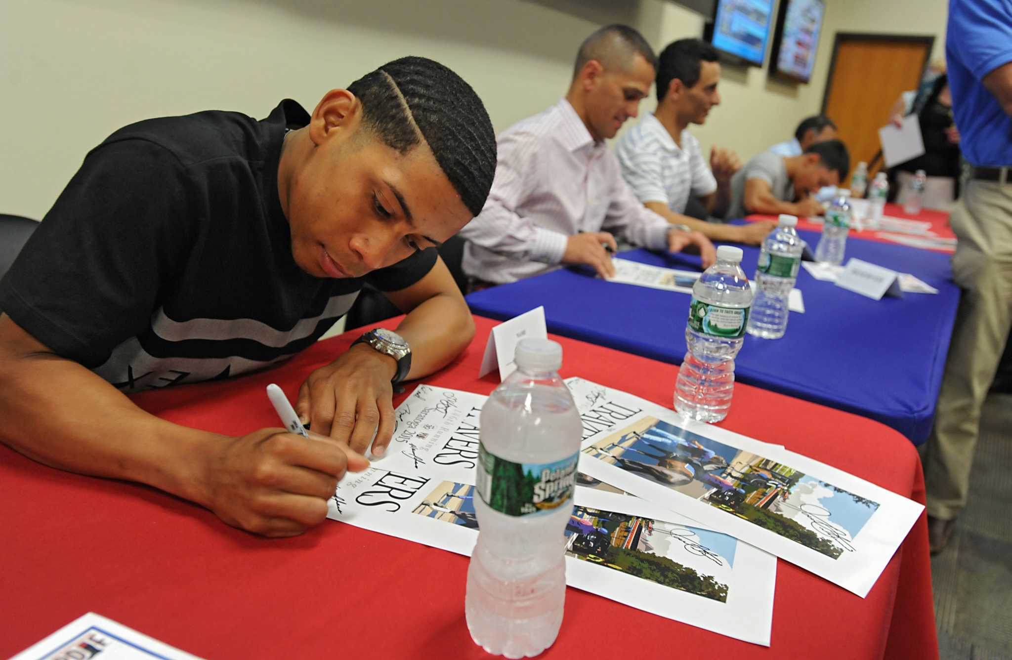 Photos: Signing for a cause