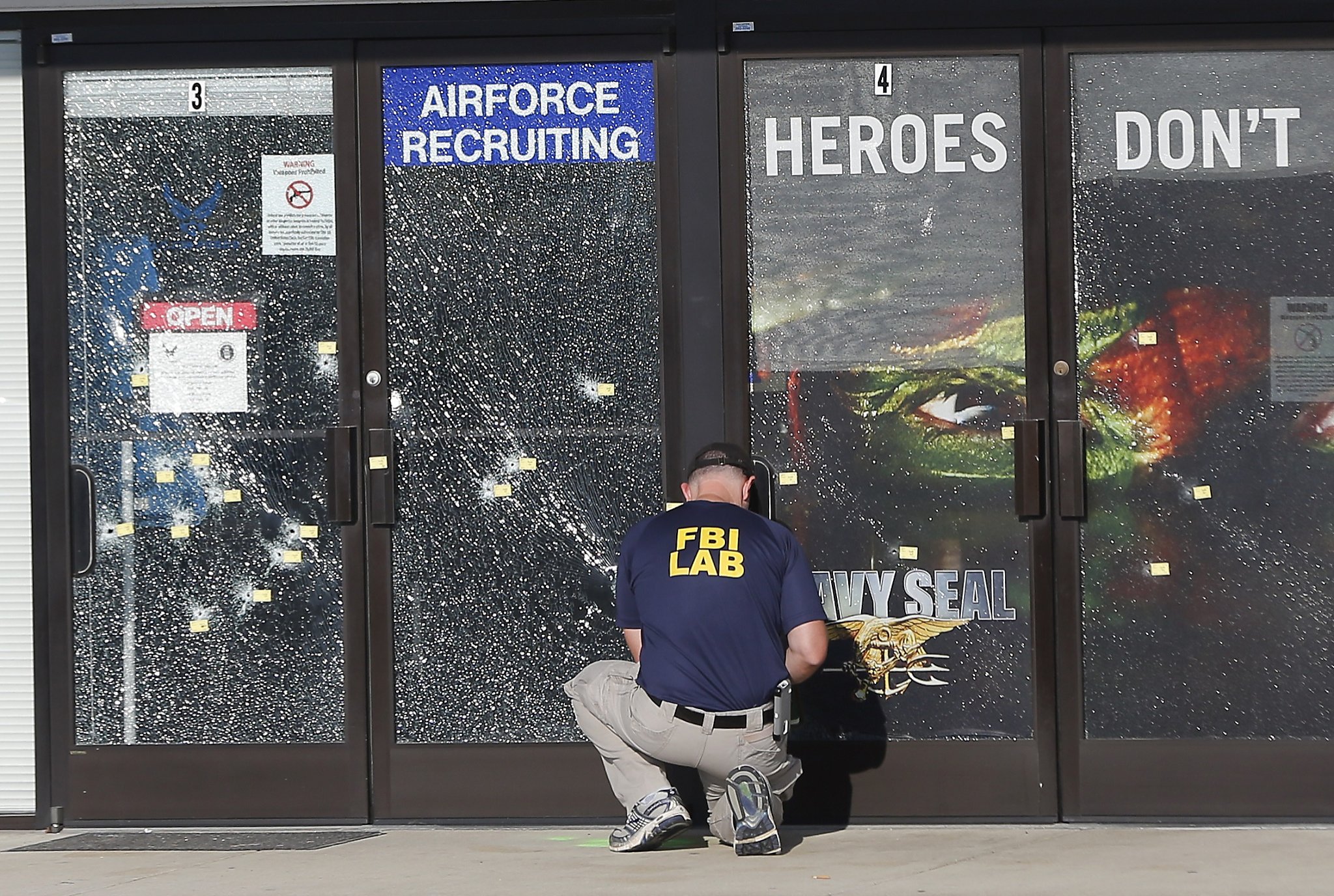 A look at attacks on military bases in the US
