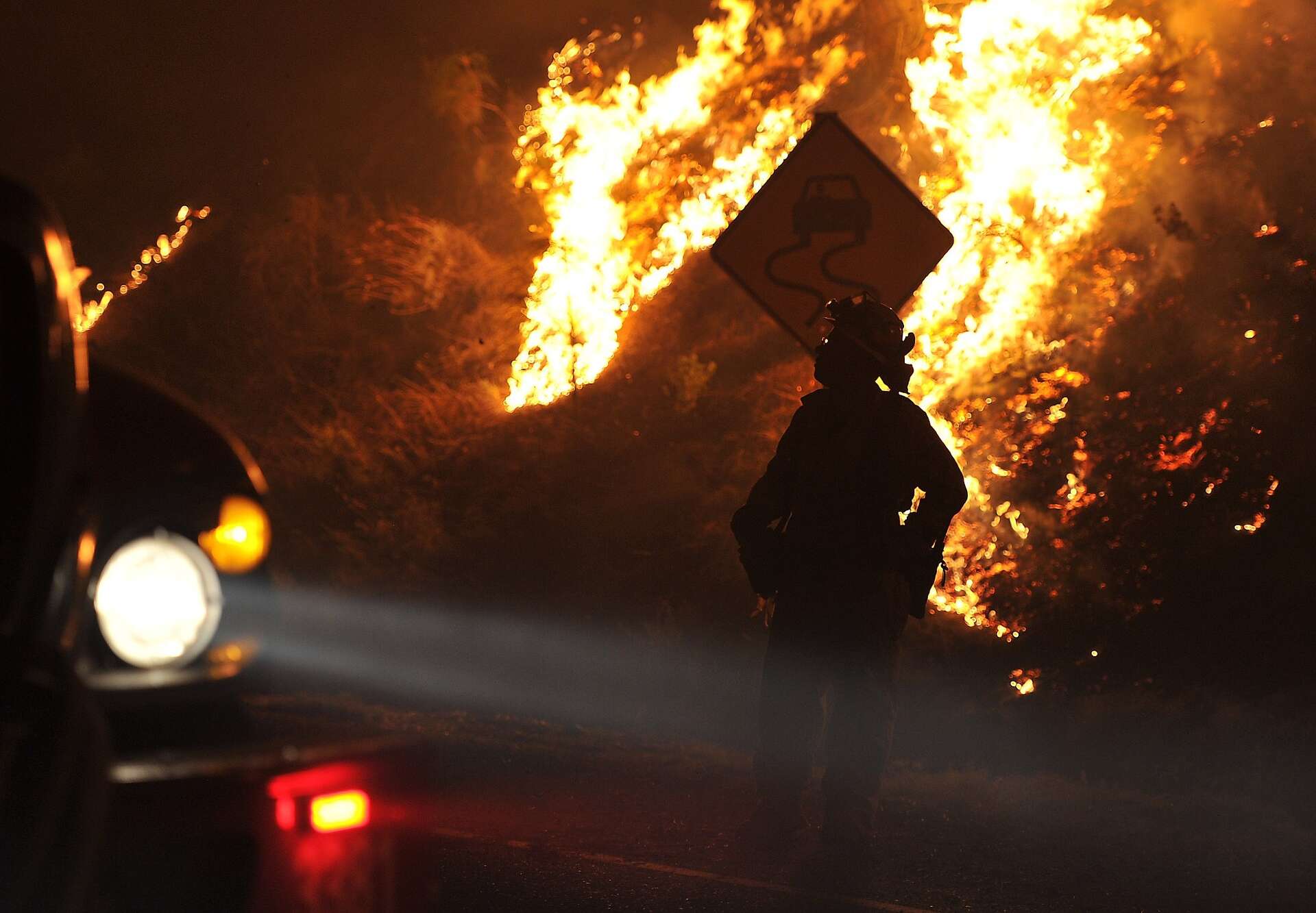 Rocky Fire doubles and shifts, but remains a threat to more homes