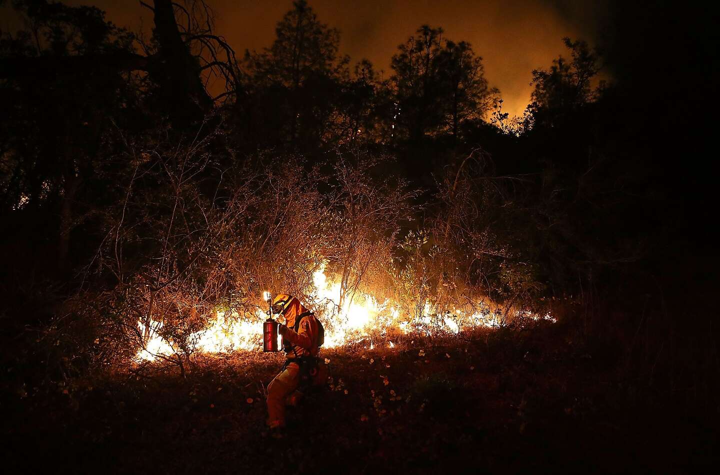 Rocky Fire doubles and shifts, but remains a threat to more homes