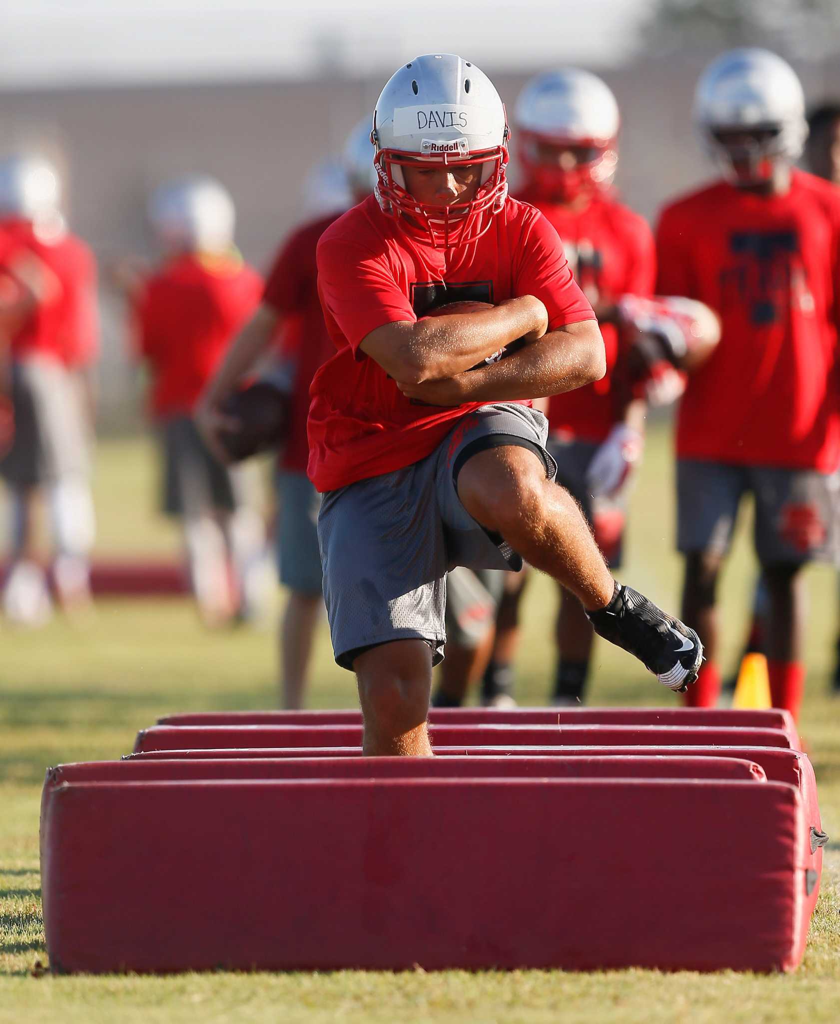 New Travis coach Sissom doubles his fun