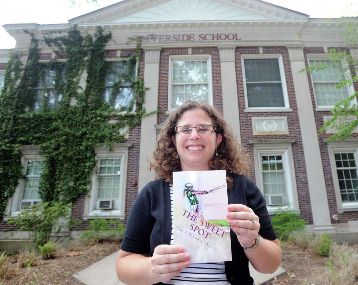 Greenwich teacher publishes first book