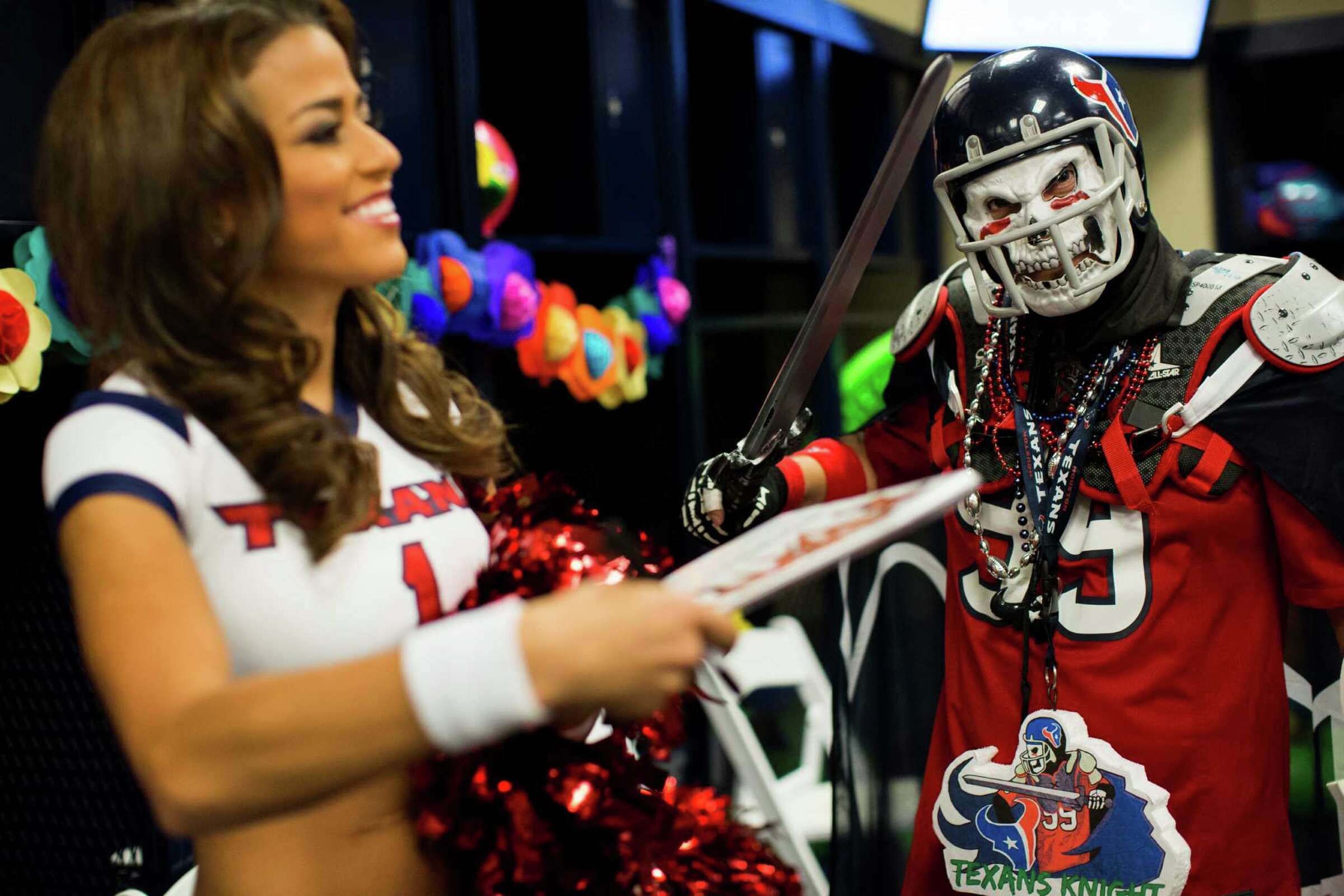 Texans' cheerleaders unveil annual swimsuit calendar
