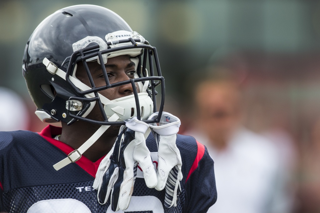 Diagnosed with lymphoma, Andre Hal watches Texans practice