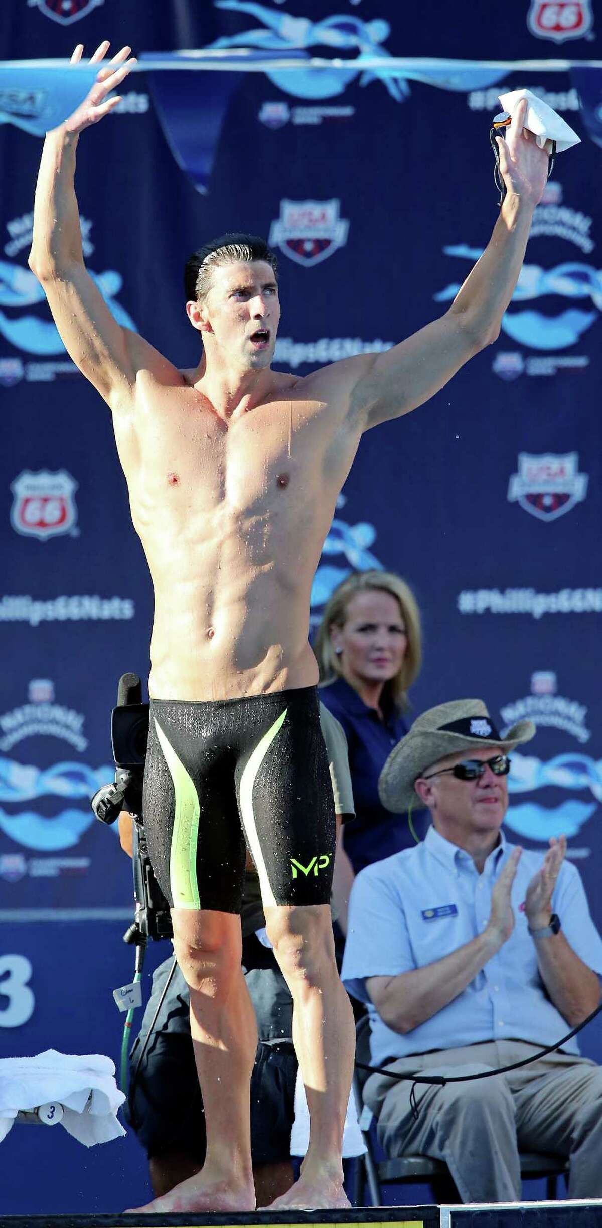 Phelps swims to third straight world-best time