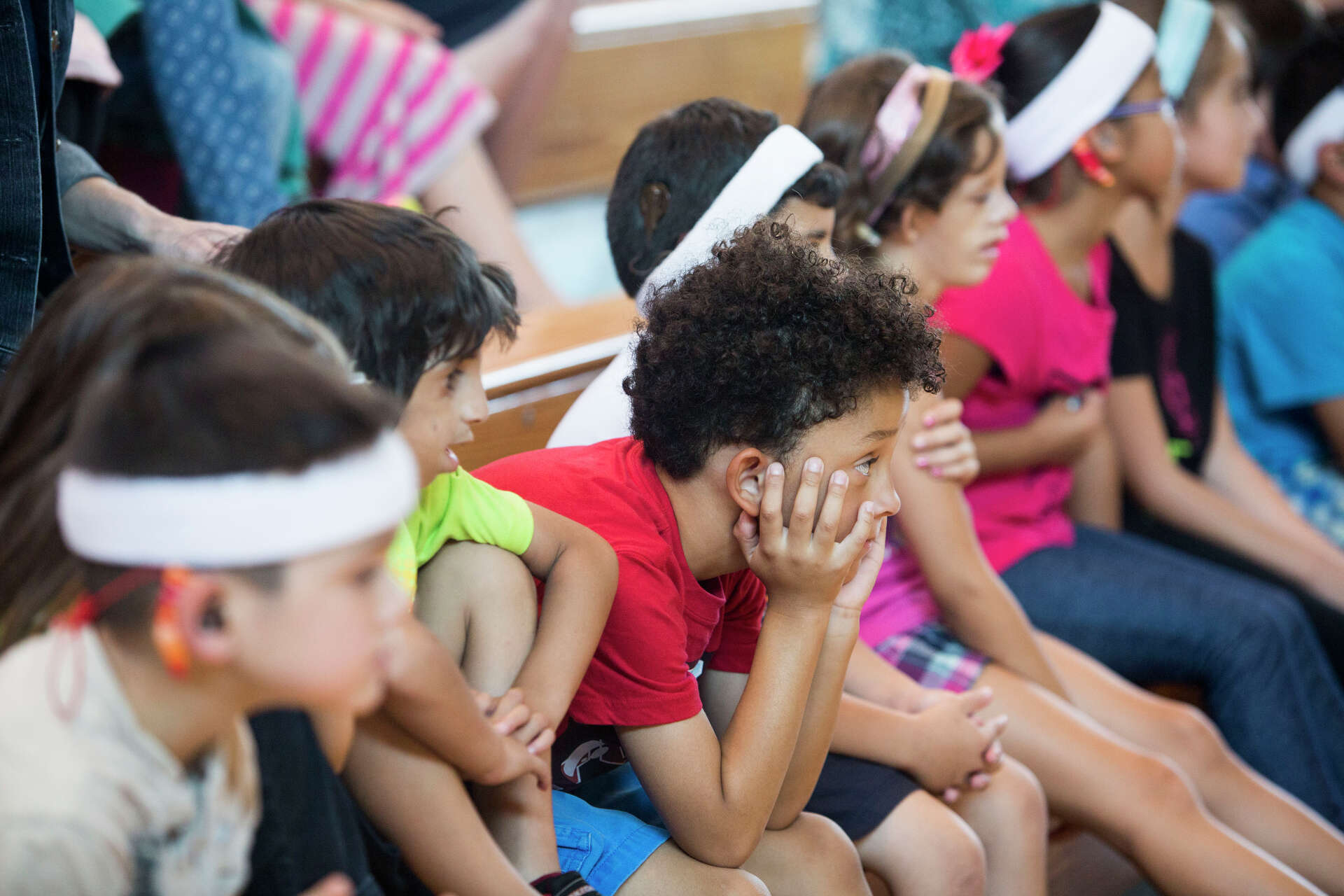 Deaf competitive swimmers share tips with students at Sunshine Cottage
