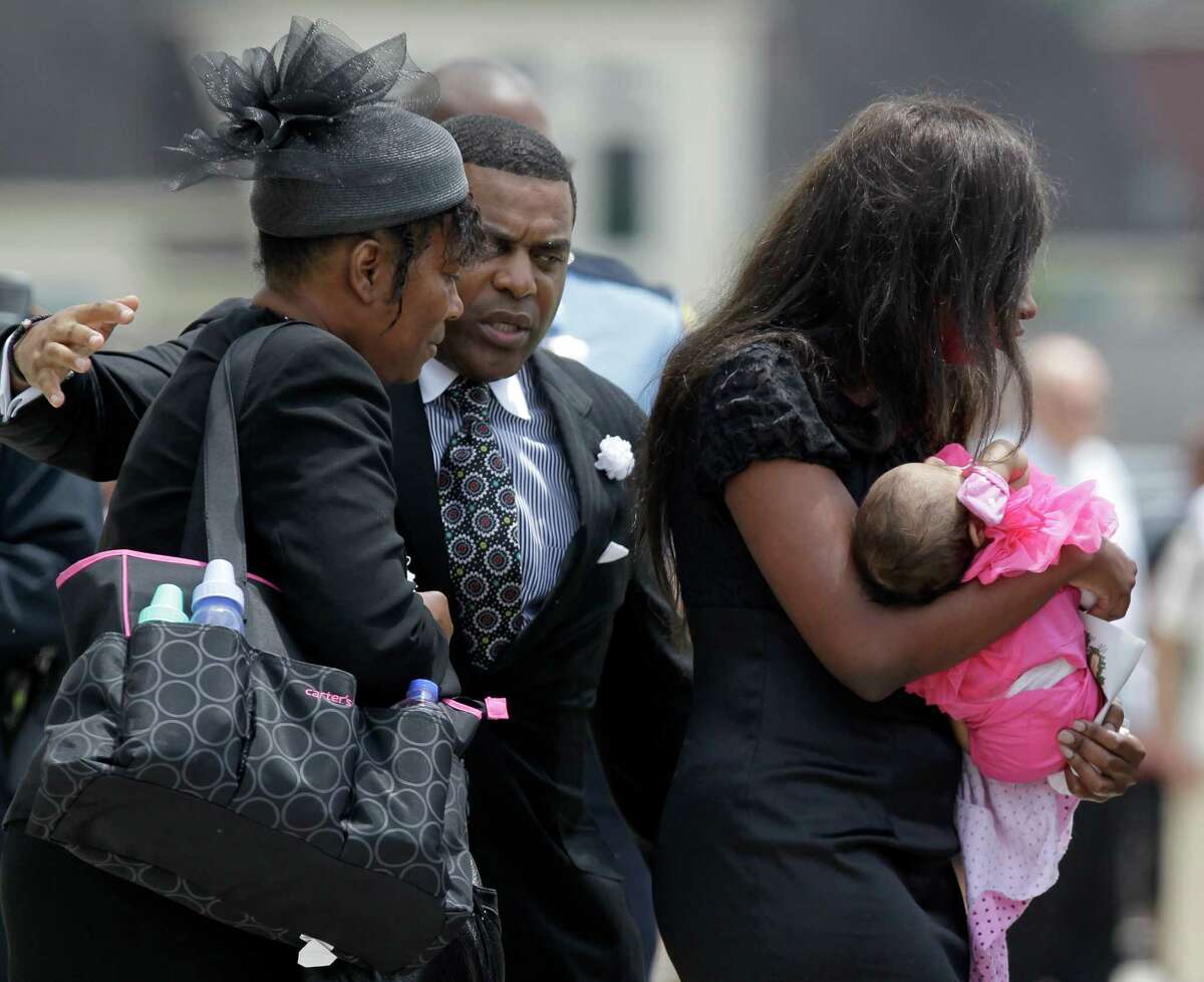 Houston mourns massacred family