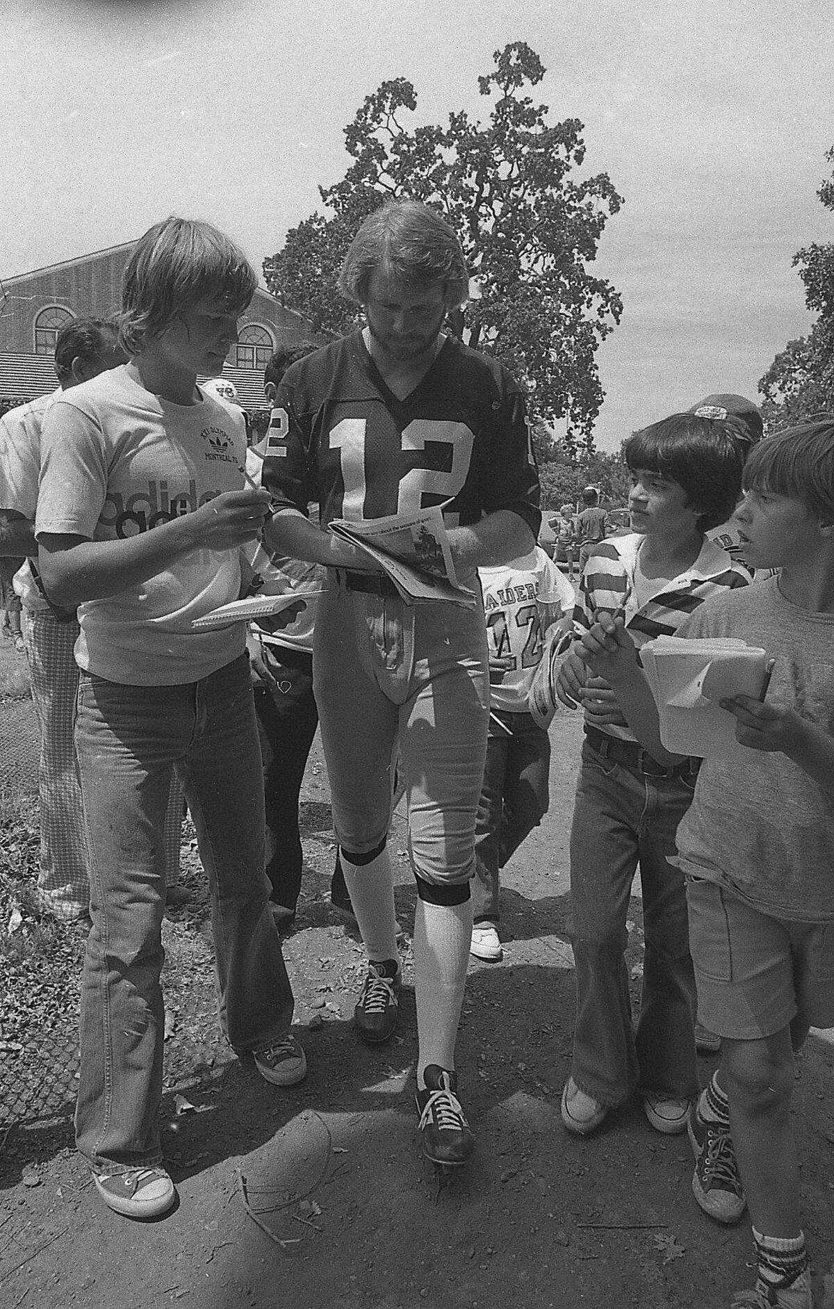 Just grin, baby: Classic Raiders training camp photos, 1960-2015