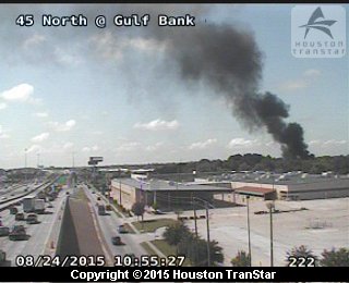 Fire burns building in north Houston