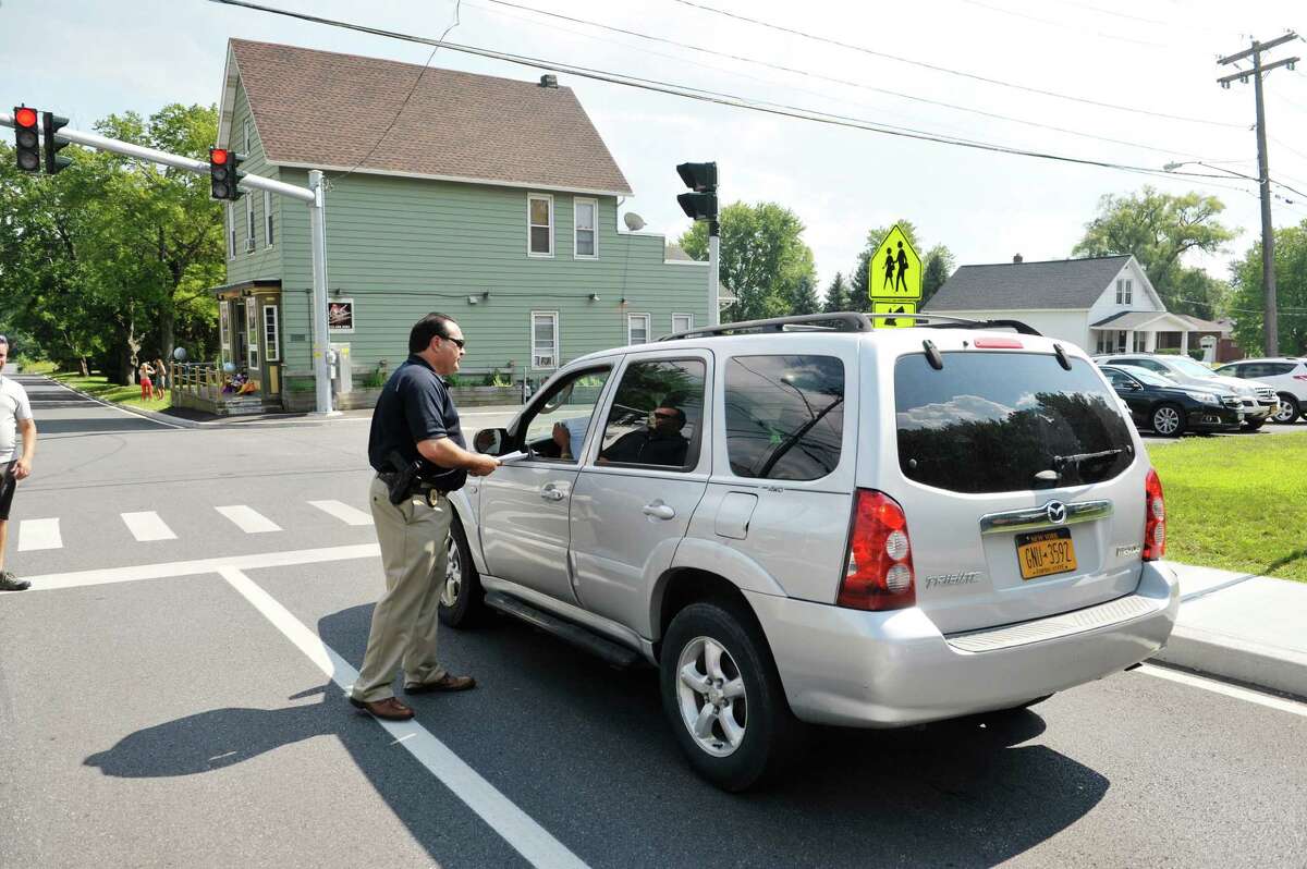 Colonie police distribute fliers in search for stylist's killer