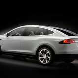 Tesla reveals new photos, new details of Model X SUV - SFGate