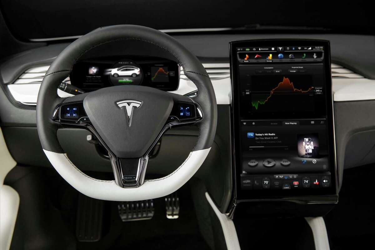 Tesla reveals new photos, new details of Model X SUV