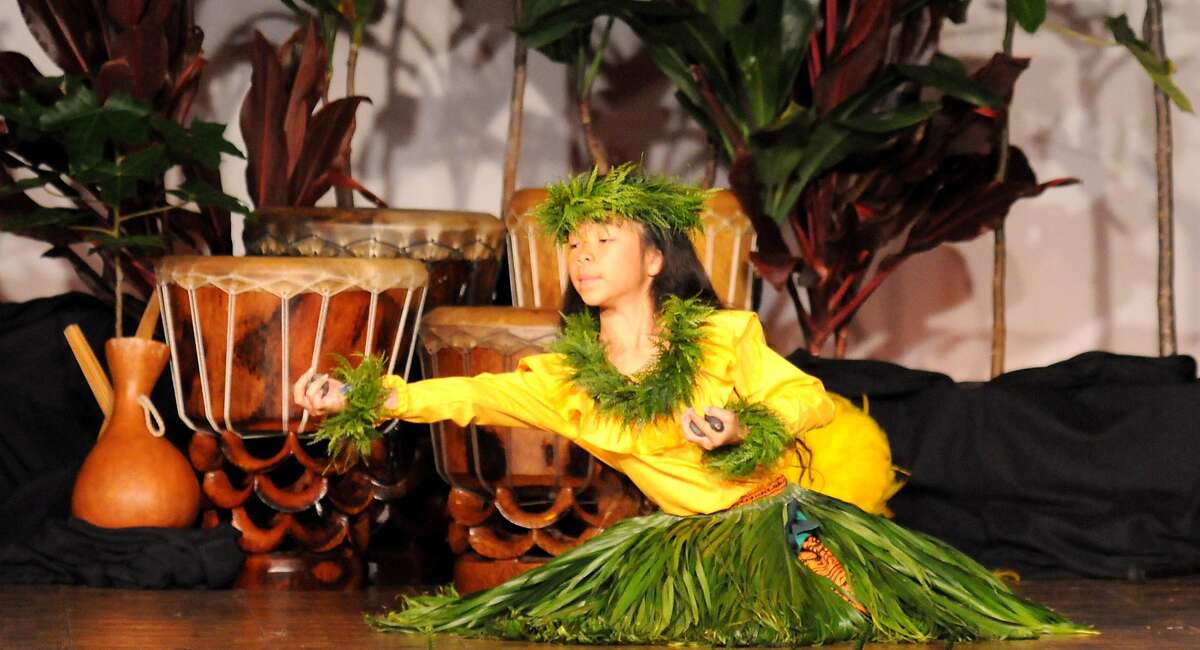 Experience authentic Hawaii in hula shows, annual contest