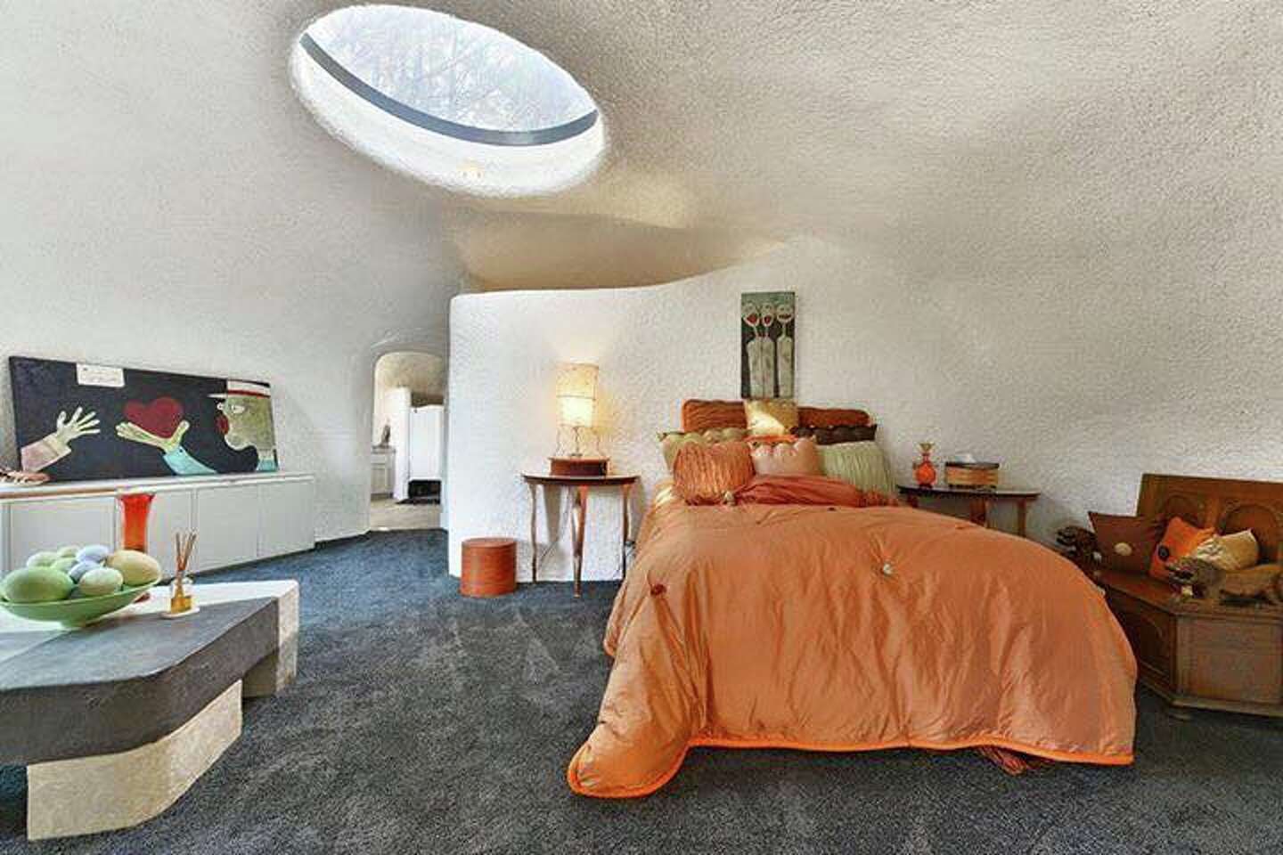 Iconic Flintstone house welcomes new residents – a herd of massive dino ...