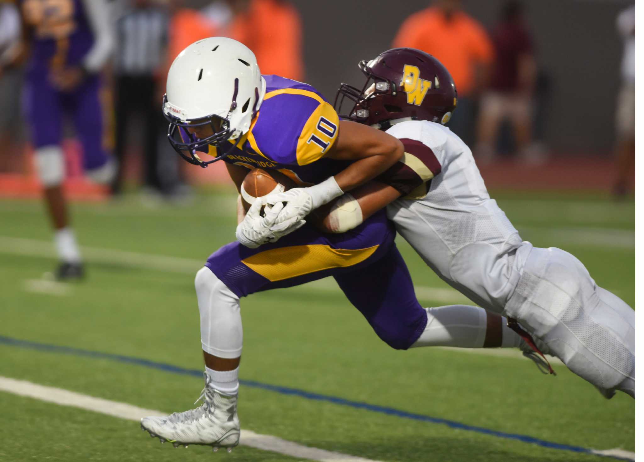 Devine runs over Brackenridge