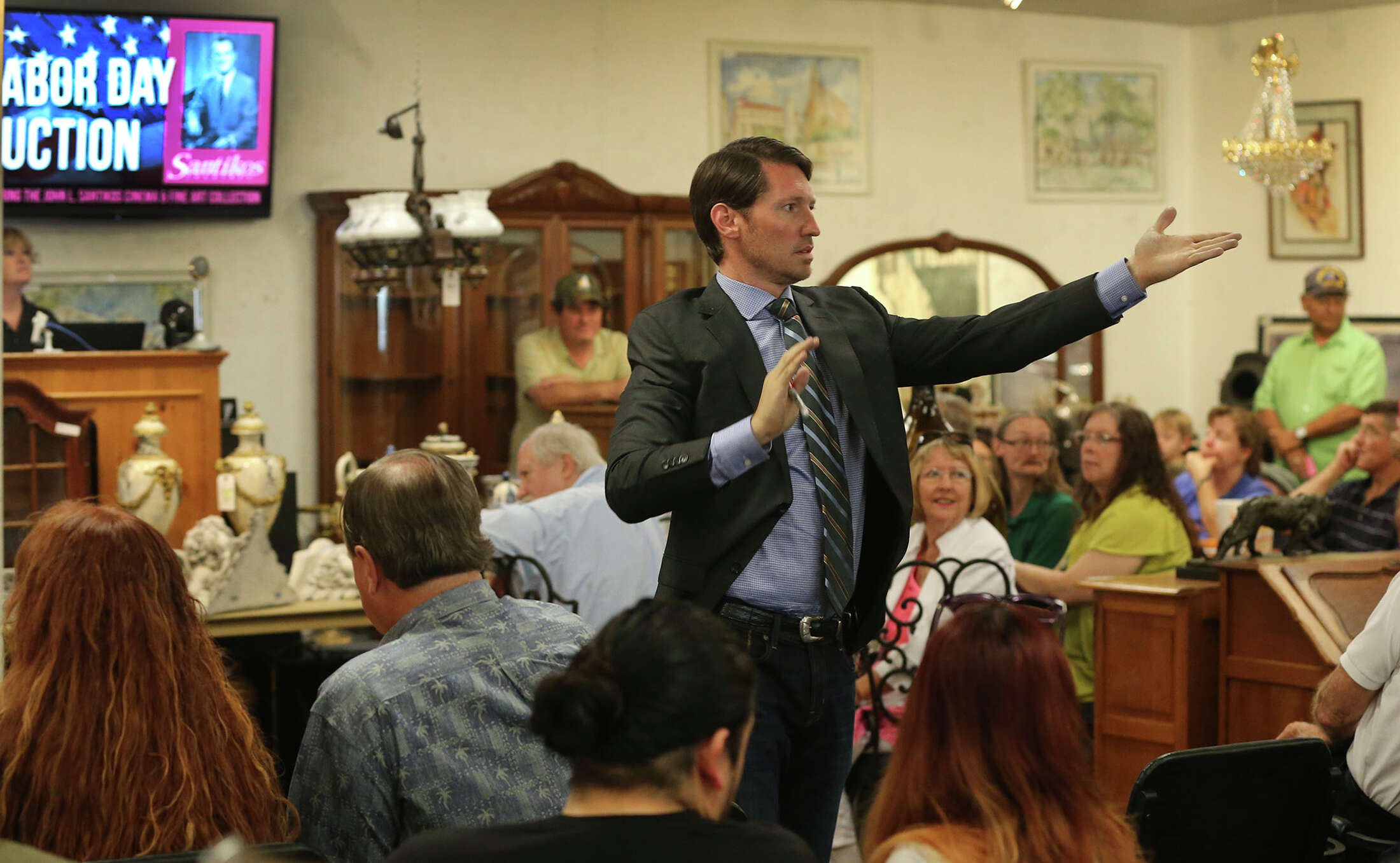 Auction starring John Santikos gets two thumbs up
