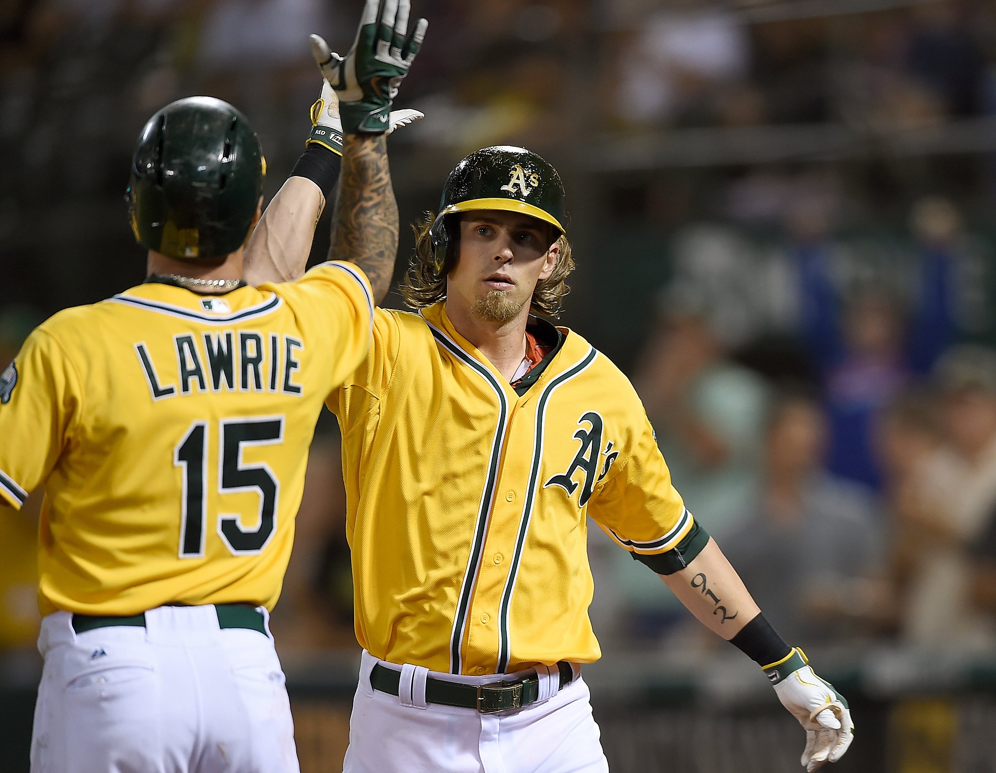 Astros out-homer A’s, win 11-5