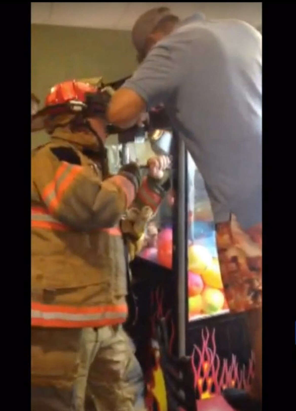 Texas firefighters rescue child trapped in arcade game