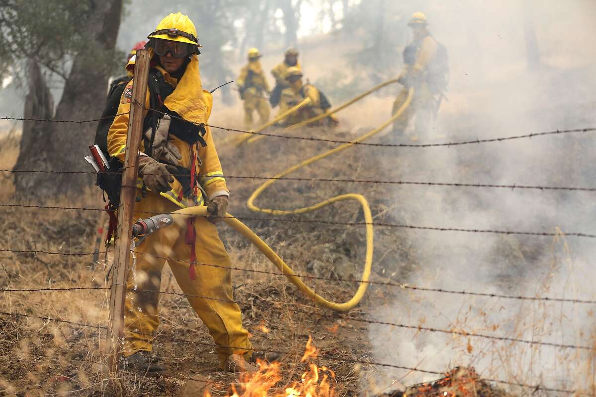 Valley Fire burns at least 585 homes, claims life of disabled woman