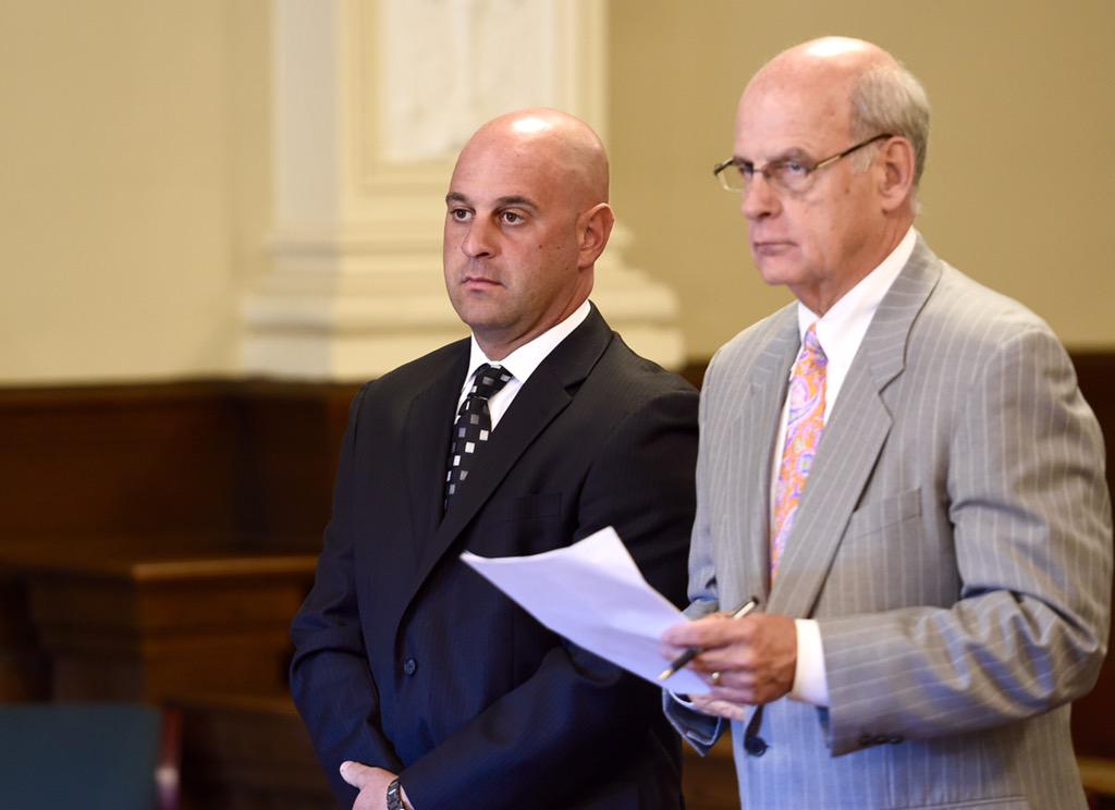 Troy cop who tipped off drug dealer is silent during sentencing