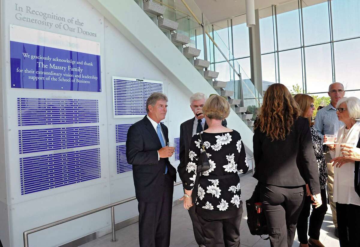 Photos: UAlbany names business building for Massry family