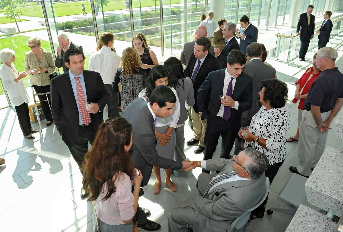 Photos: UAlbany names business building for Massry family
