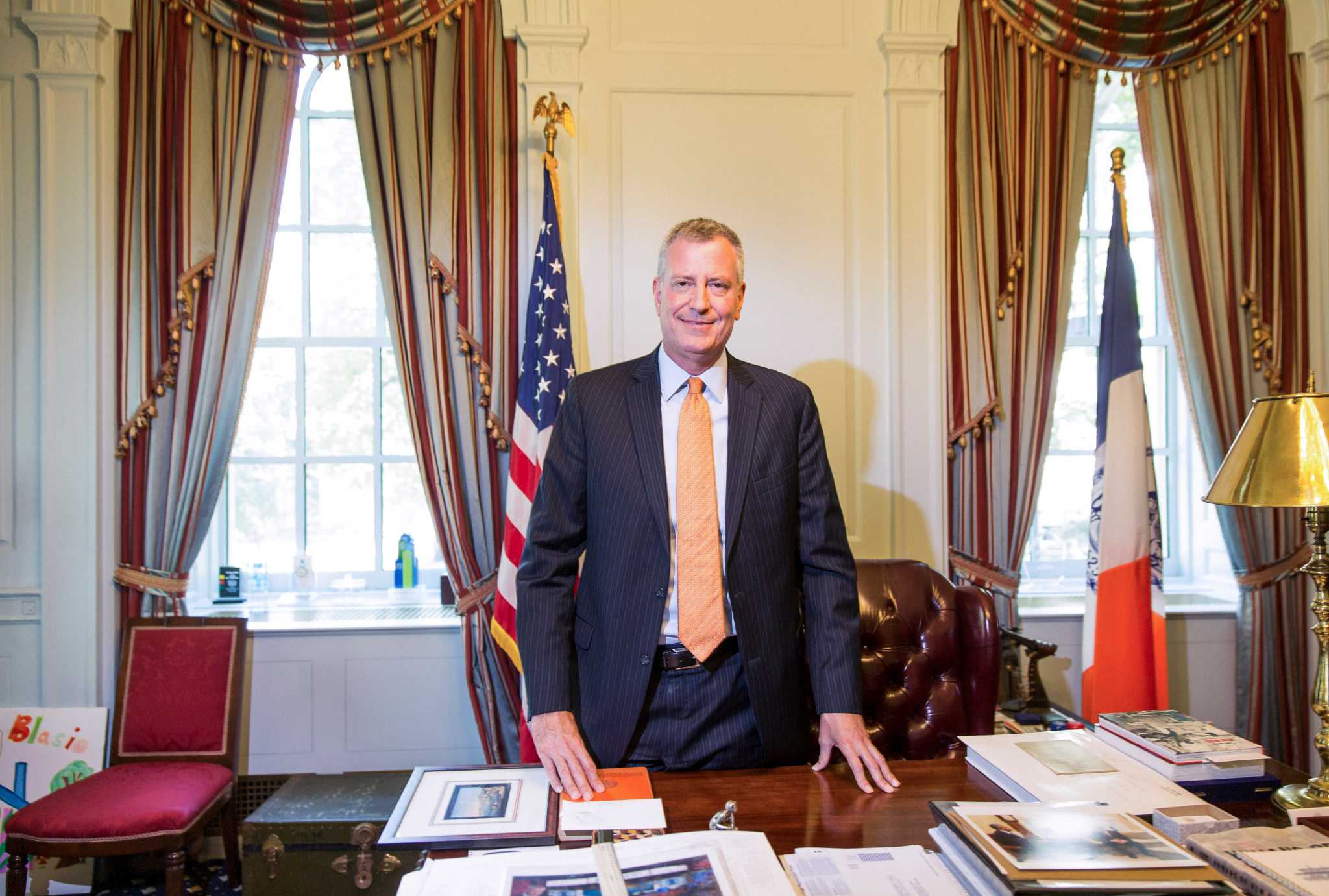 Invoking pope, mayor touts help for homeless