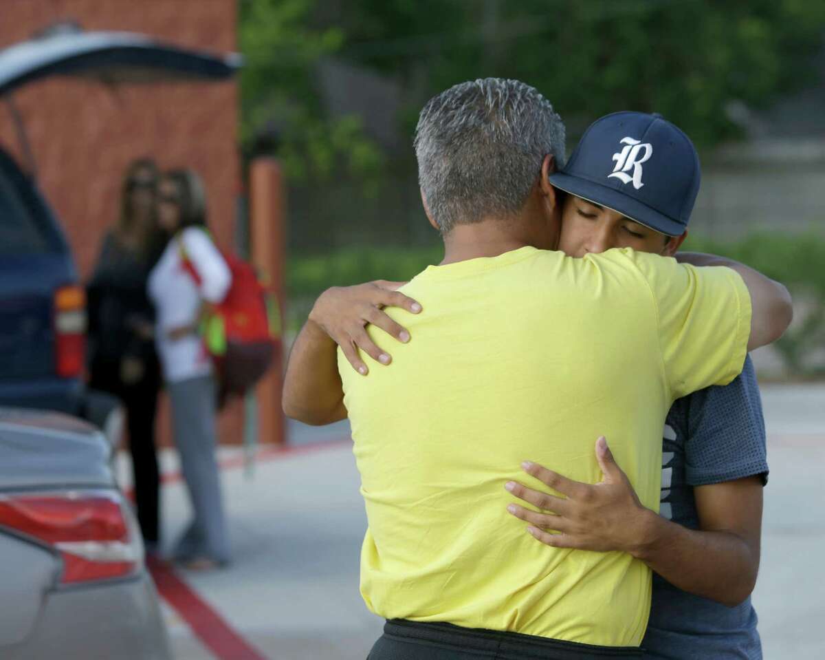 Father, son have emotional reunion after dad cleared of murder-for-hire ...
