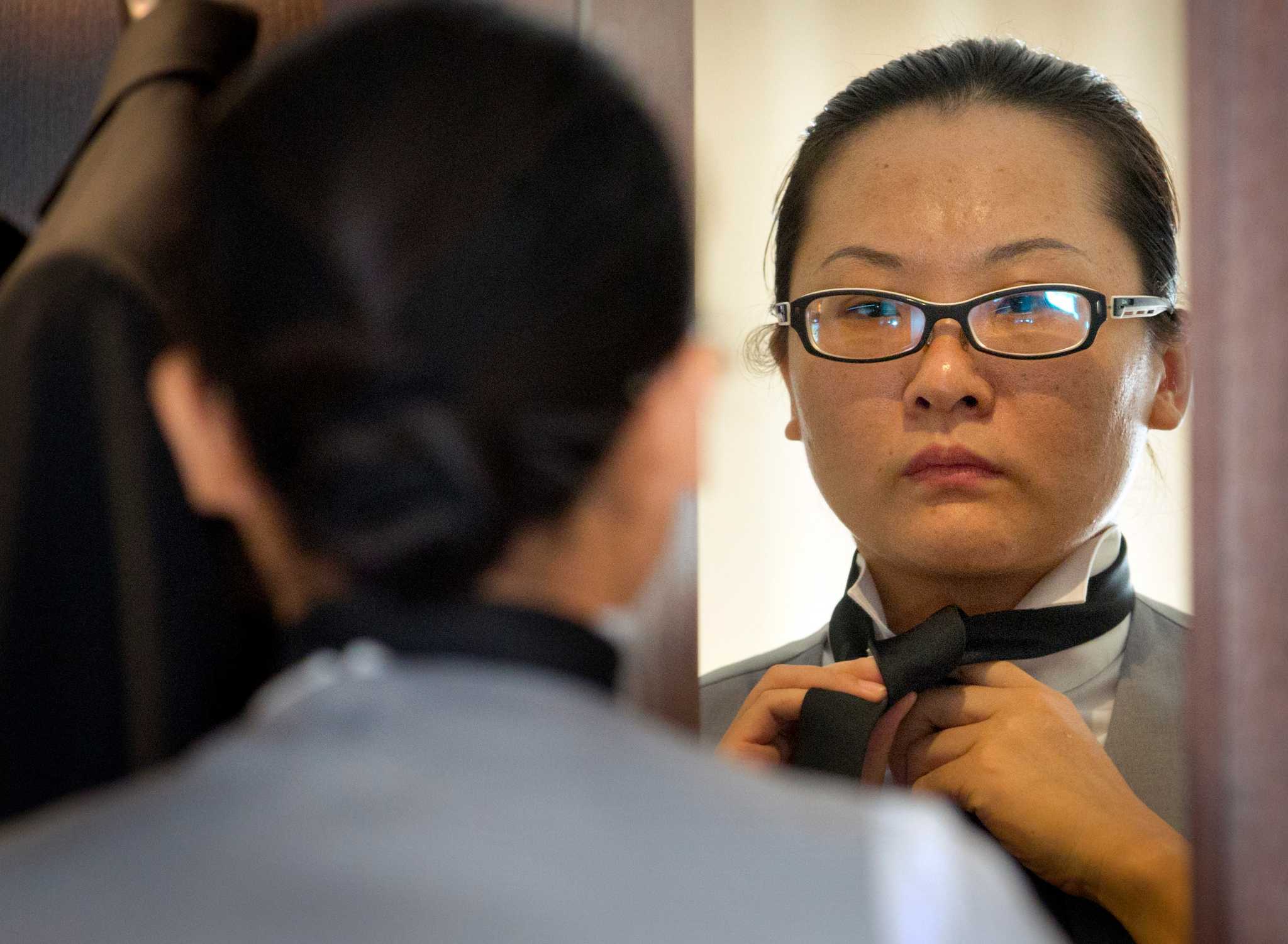 White-gloved butlers a new must-have for China's super-rich