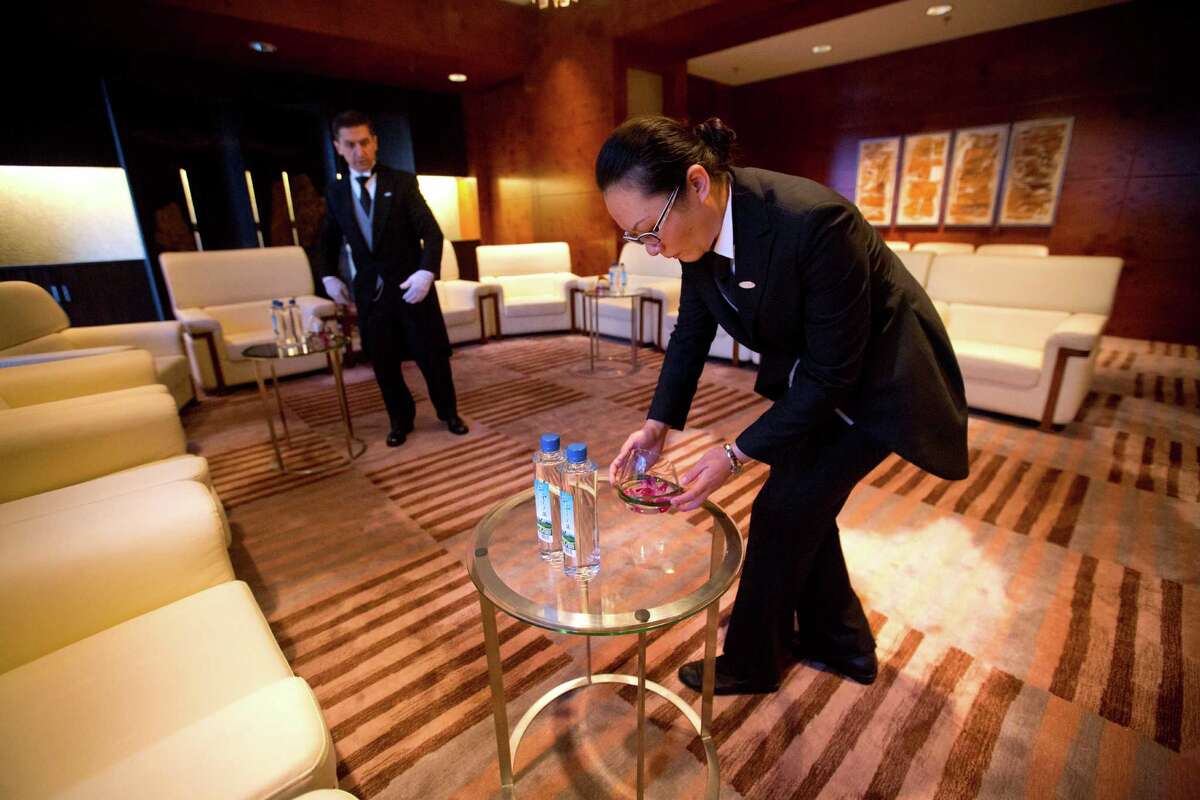 White-gloved butlers a new must-have for China's super-rich