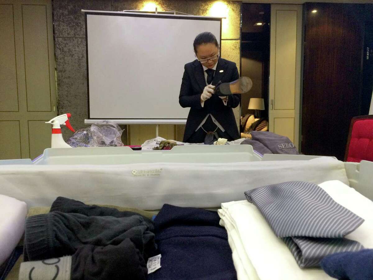 White-gloved butlers a new must-have for China's super-rich