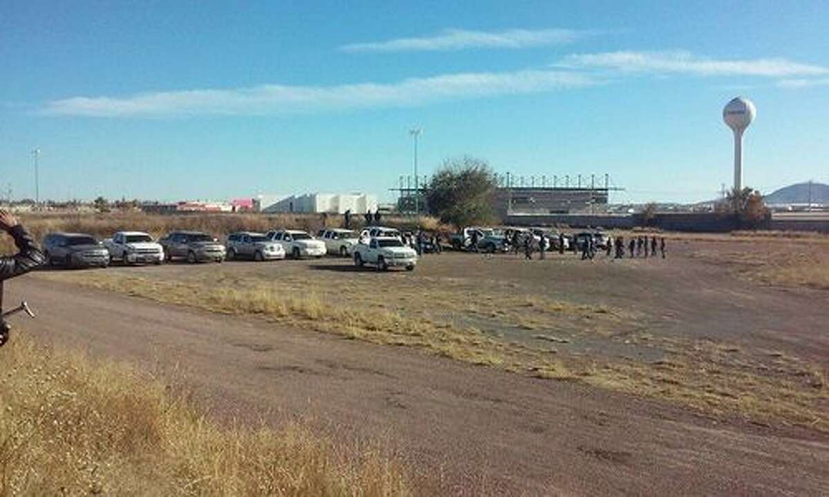 Photos leaked of La Linea cartel members holding guns, showing off trucks