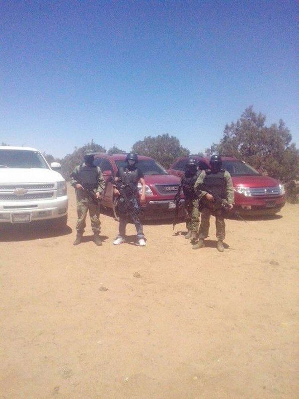 Leaked video claims to show young Mexican drug cartel assassins holding ...