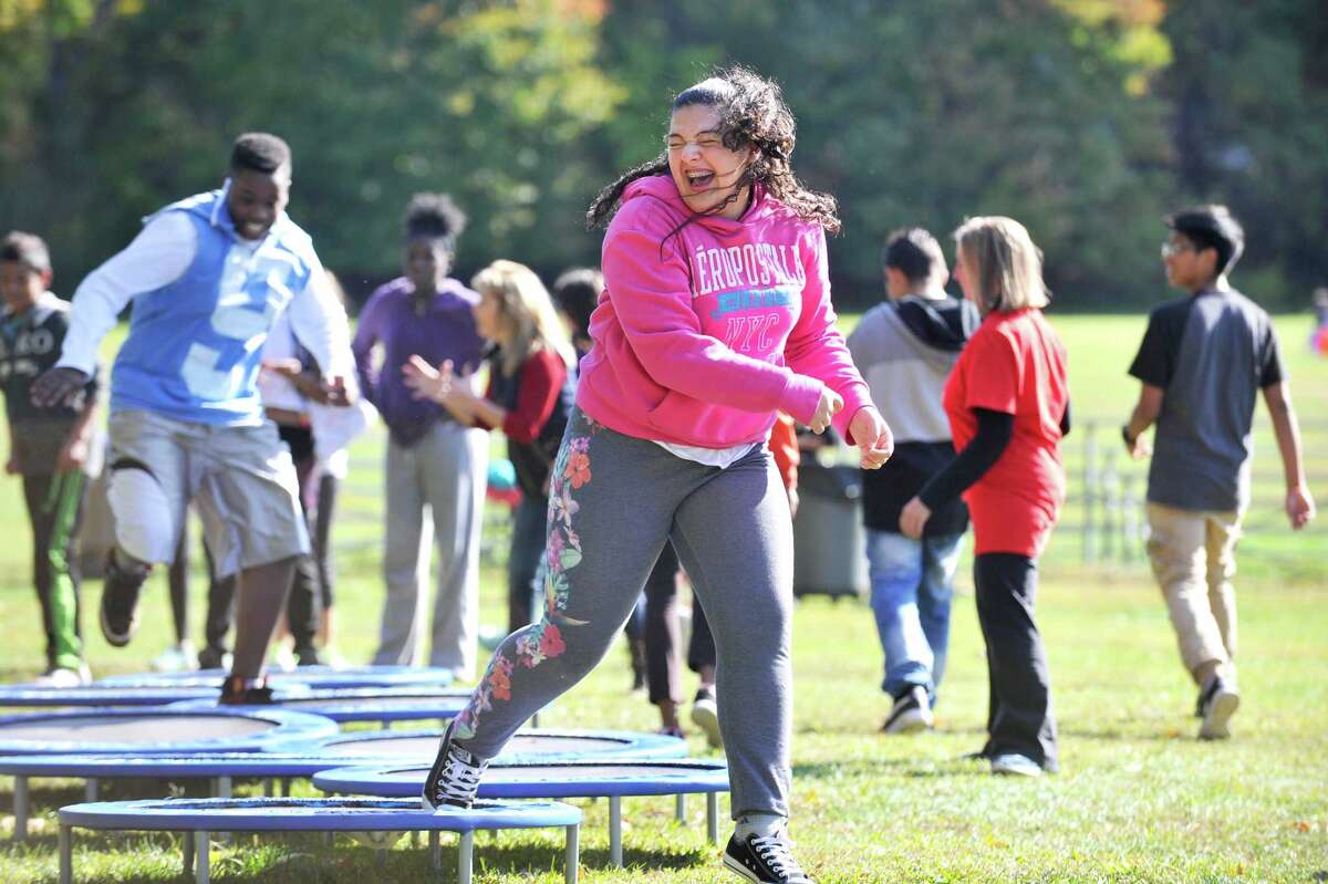 Stamford middle-schoolers run obstacle course to raise funds